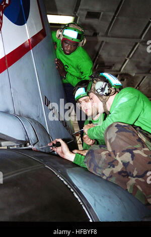 An air-to-air bottom view of an F-14 Tomcat aircraft from Fighter ...