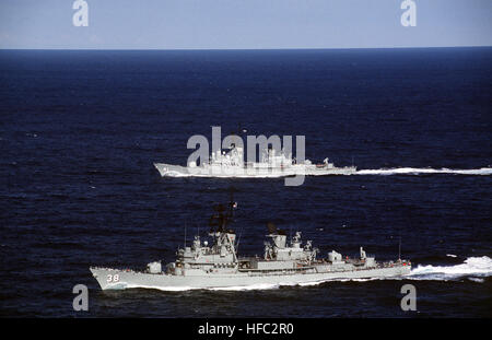 Port side views of the guided missile destroyers HMAS Perth (DDG-38 ...