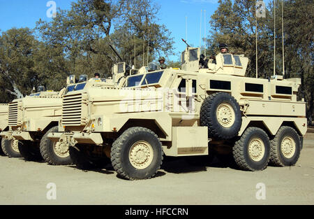 A mine-resistant ambush-protected (MRAP) all-terrain vehicle (M-ATV ...