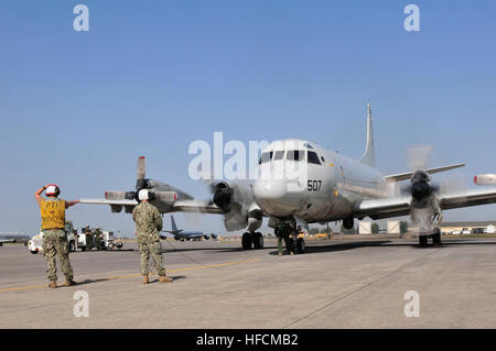 Personnel from NAS Sigonella check the propeller of a C-26 Metroliner ...