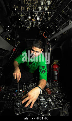 Aviation Electrician's Mate 1st Class Jesse Sabol (left), from ...