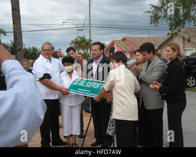 Mayor Julio Robaina and the City Council pose for a photograph with the ...
