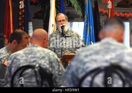 A Navy chaplain offers a blessing during the disassembly of a British ...