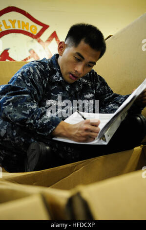 Damage Controlman 3rd Class Geronimo ContrerasBallin, assigned to amphibious dock landing ship ...