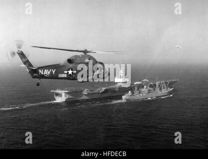 UH-2B over USS Enterprise (CVAN-65) and USS Virgo (AE-30) 1966 Stock ...