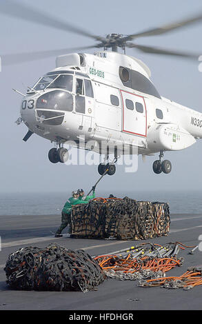 US Navy An embarked combat cargo Marine aboard USS Bataan (LHD 5 ...