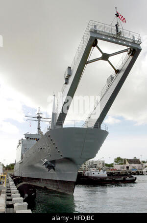 Crew members aboard the tank landing ship USS SPARTANBURG COUNTY (LST ...