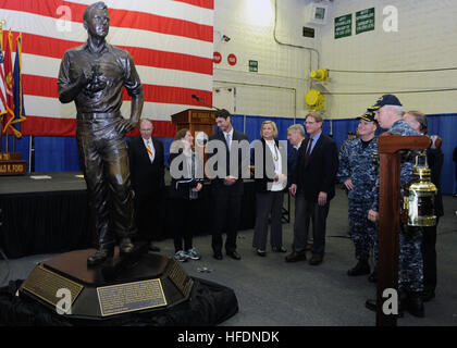 A bronze statue honoring President Gerald R. Ford is unveiled aboard ...