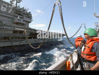 US Navy A phone talker watches as USS John F. Kennedy (CV 67), takes on ...