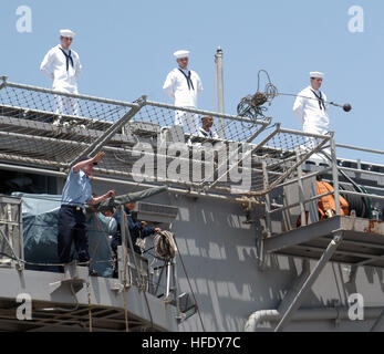 US Navy Equipment is off-loaded from the amphibious dock landing ship ...