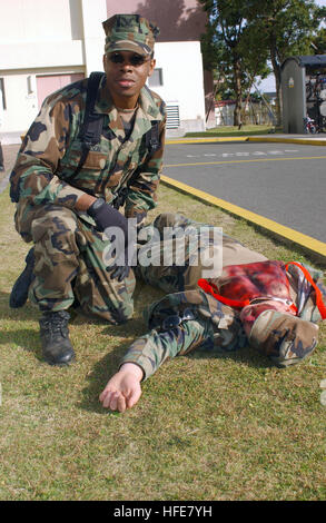 Security police and disaster preparedness personnel participate in a ...