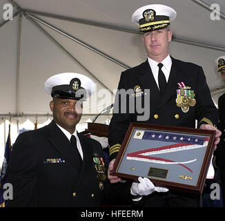 The Command Master Chief aboard USS Bonhomme Richard (LHD 6) conducts a ...