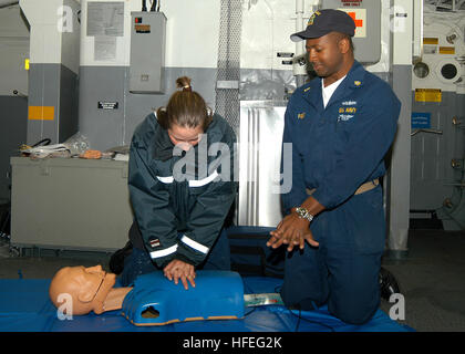 US Navy how to properly apply Cardiac Pulmonary Resuscitation Stock ...