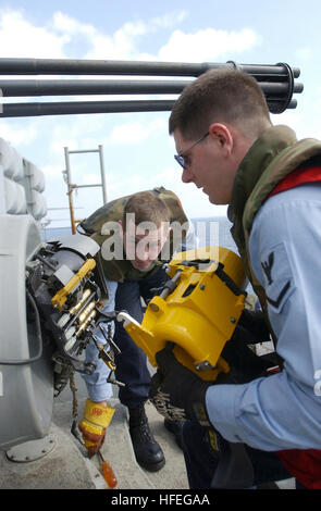 US Navy Fire Controlman Joshua L. Tillman along with three other Fire ...