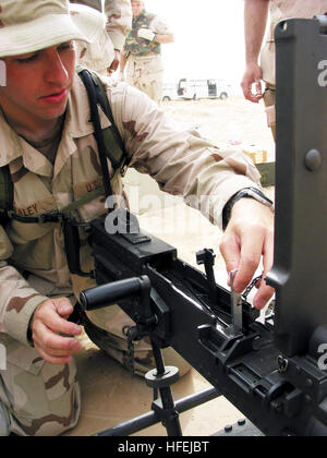 Reserve GUNNER's Mate 3rd Class (GMG3) Jim Hall ensures that personnel ...