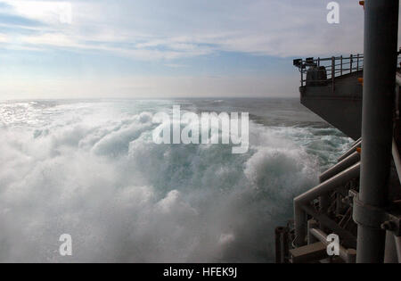 US Navy A huge wake is created as Ronald Reagan conducts high-speed ...
