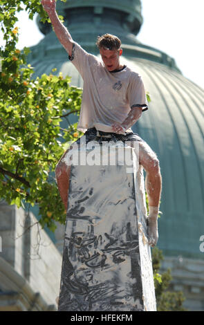 A photograph of the U.S. Naval Academy graduation exercises, showcasing ...