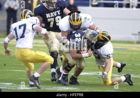 US Navy Navy Junior Fullback Kyle Eckel runs over Air Force Academy ...