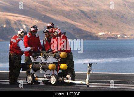 US Navy Aviation Ordnancemen inspect AIM-9 Sidewinder air-to-air ...
