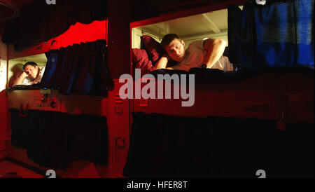 US SAILORS in their bunks aboard an aircraft carrier in 1943 Stock ...