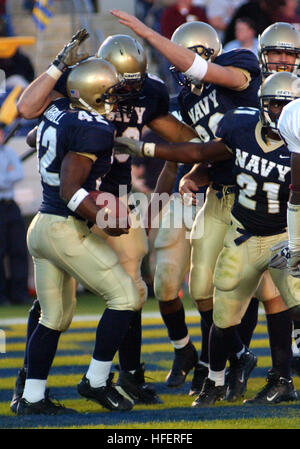 Navy midshipmen celebrate a Navy touchdown during the second half of an ...