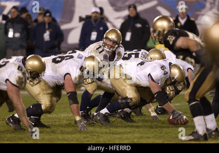 US Navy Quarterback calls signals before getting the snap from his ...