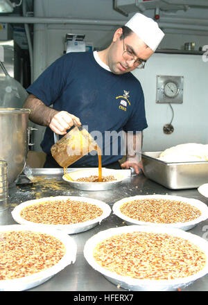 US Navy Mess Management Specialist 1st Class prepares the July Birthday ...