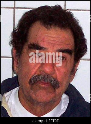 US Navy Former Iraqi leader Saddam Hussein following his capture by ...