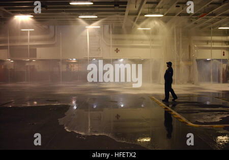 US Navy Master observes Aqueous Film Forming Foam (AFFF) sprinkler ...