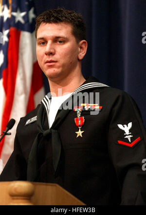 GREAT LAKES, Ill. (Feb. 23, 2023) Force Master Chief Jason Knupp, left ...