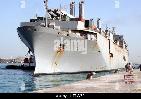 US Navy Tugboats ease the Military Sealift Command (MSC) fast sealift ship USNS Bellatrix (T-AKR ...