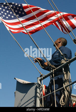 A signalman on the nuclear-powered aircraft carrier USS ABRAHAM LINCOLN ...