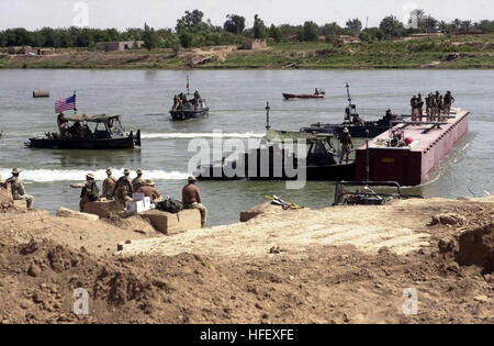 an army armed forces launch pontoon floating bridge making boat from ...