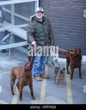 Alan Carr and his three dogs outside ITV Studios Featuring: Alan Carr ...