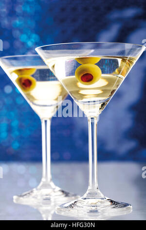 One martinis glass with olive Stock Photo - Alamy