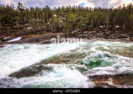 The full Otta River fed from the thawing snow and ice in Spring Stock ...