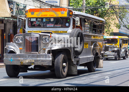 Jeepney service on the street in city centre, Manila, Philippines Stock ...