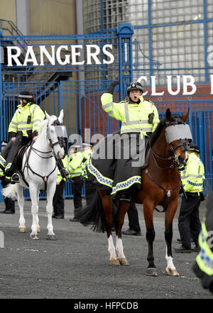 Mounted police direct fans outside Ibrox Stadium before the Ladbrokes ...
