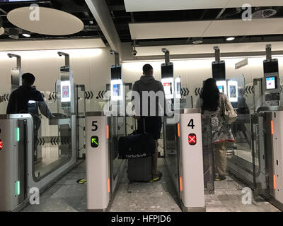 Biometric ‘chipped’ passport entrance. Passengers at Heathrow using ...