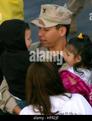 A Sailor assigned to Beachmaster Unit One (BMU-1) signals to a Improved ...