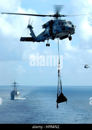 A pair of U.S. Navy MH-60S Seahawks medevac scenario role-players ...