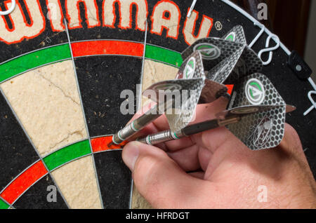A dart in the treble twenty of a UK dart board Stock Photo - Alamy
