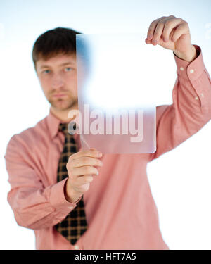 male showing something on transparent paper Stock Photo - Alamy