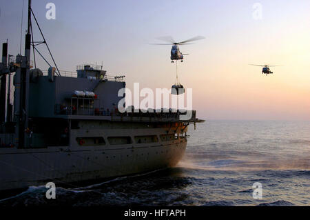 The combat stores ship USNS SPICA (T-AFS-9) rests on blocks in the ...