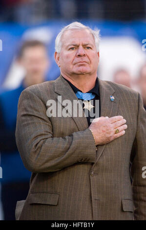US Navy Retired Navy SEAL, and Medal of Honor winner, places his hand ...