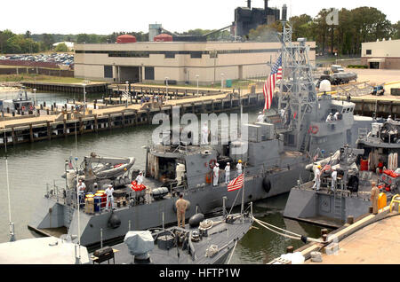 The U.S. Navy Cyclone-class coastal patrol ship USS Zephyr moors at ...