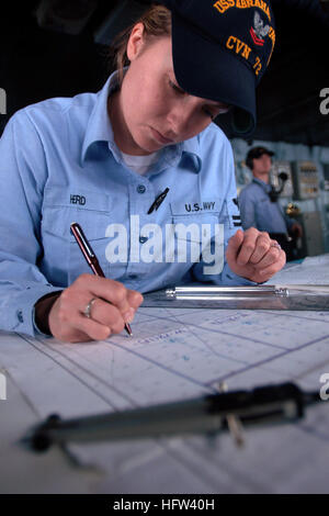 A quartermaster aboard the nuclear-powered aircraft carrier USS ...