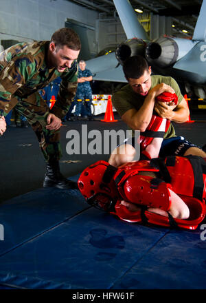 Master-at-Arms 1st Class Travis Clouse, left, and Master-at-Arms 1st ...