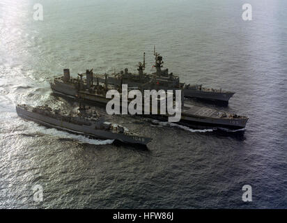 An aerial starboard view of, from front to back: the frigate USS SAMPLE ...