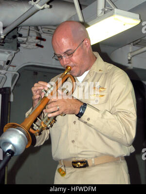 U.S. Navy Chaplain Lt. Thomas Falkenthal, left, leads the Thanksgiving ...